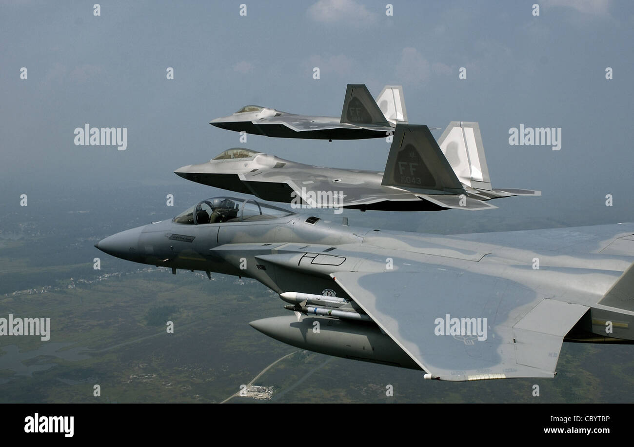F-22 Raptors fly in formation. Defense Department officials are only ...