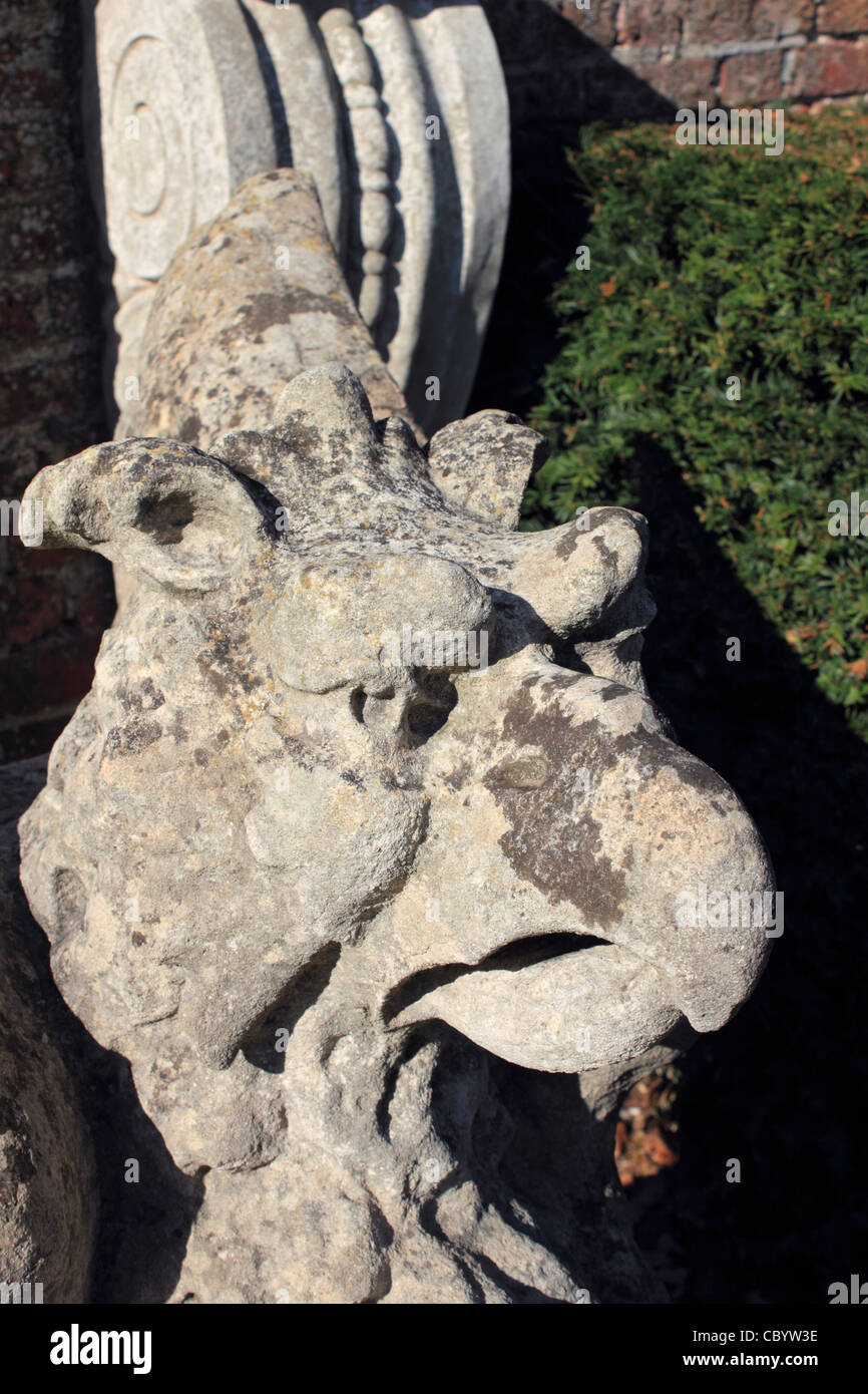Weathered Carved stone garden statue Stock Photo - Alamy
