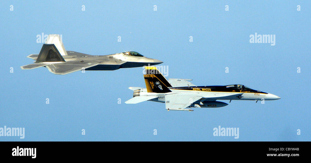 An F-22A Raptor deployed to Kadena Air Base, Japan, trains with a U.S ...