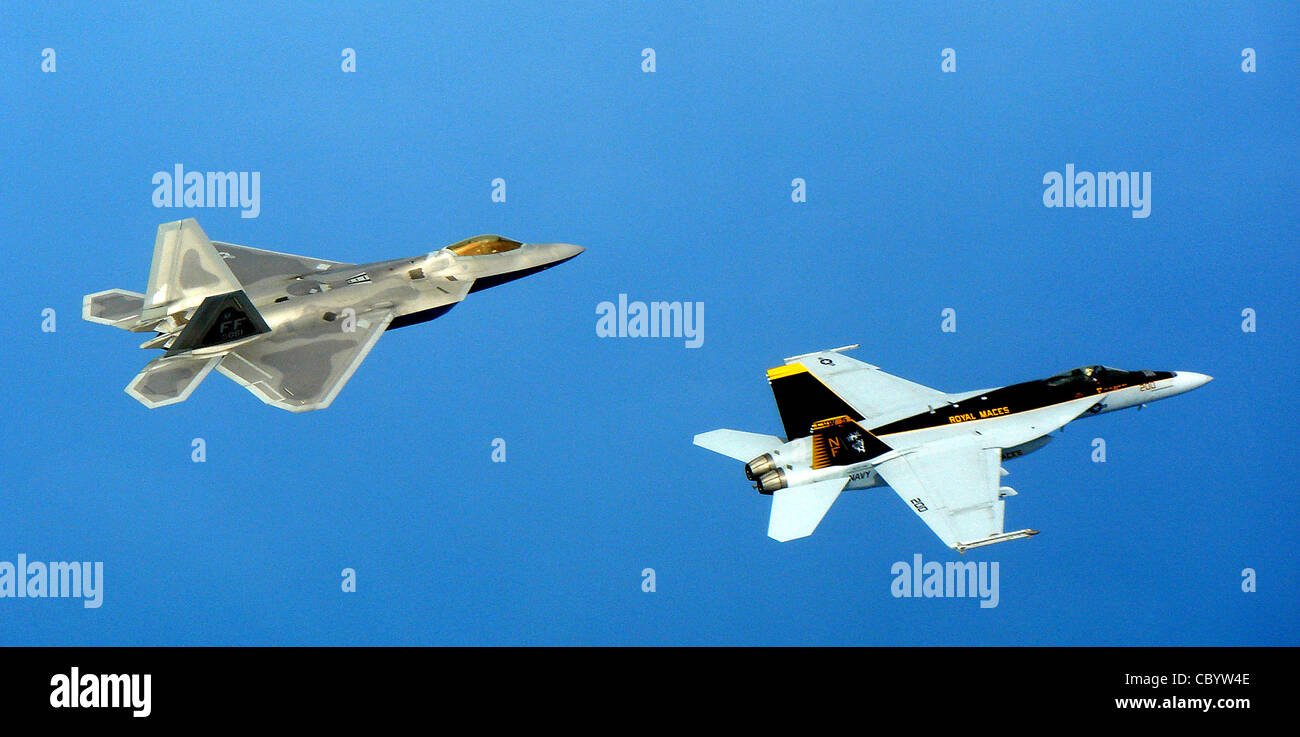 An F-22A Raptor deployed to Kadena Air Base, Japan, trains with a U.S ...