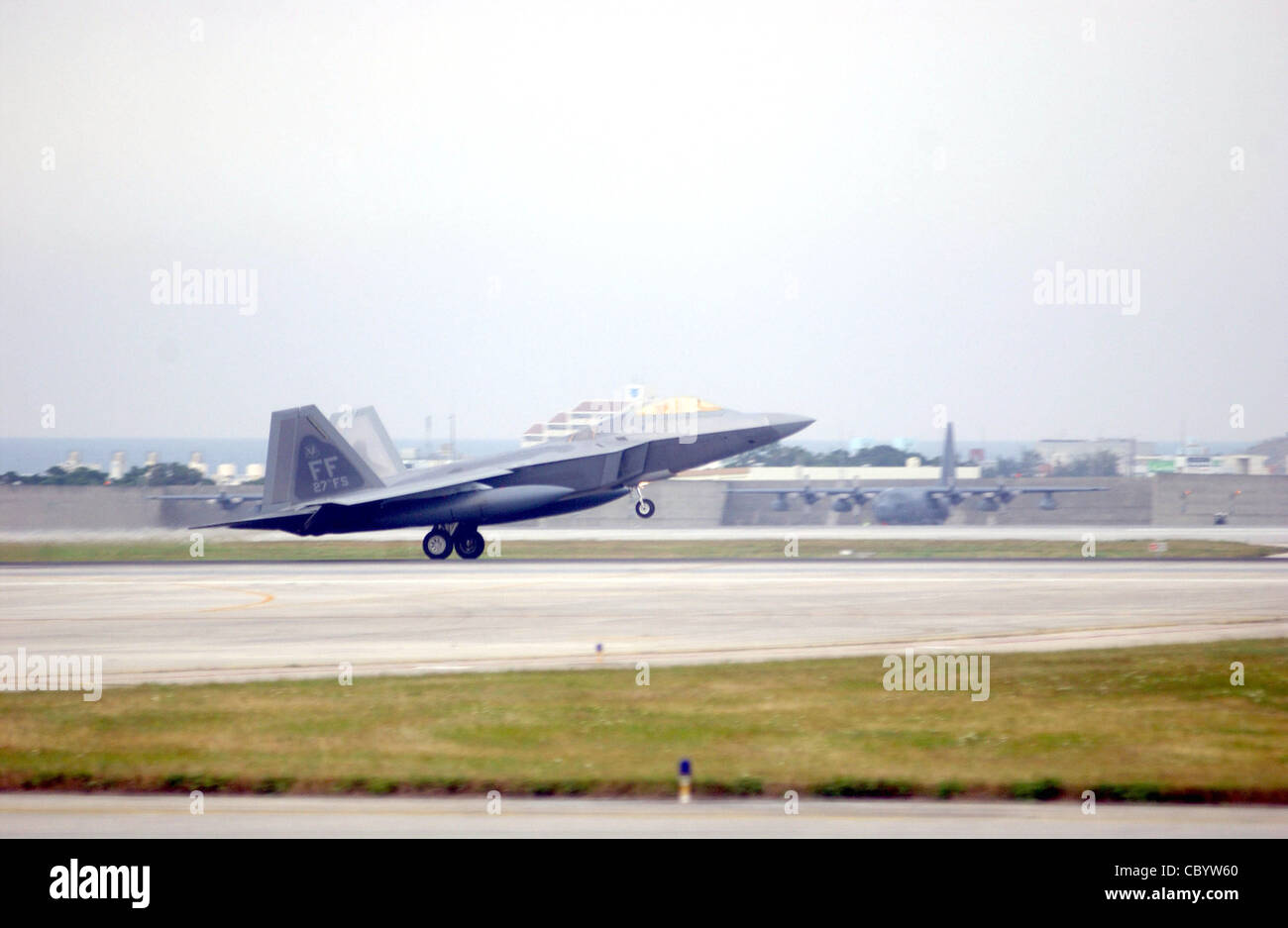 An F-22 Raptor lands at Kadena Air Base, Japan, Feb. 18, marking the ...