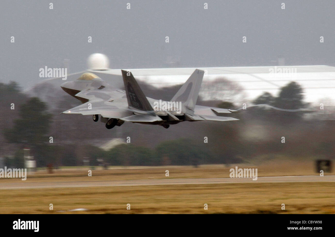 An F-22 Raptor takes off from Langley Air Force Base, Va. F-22s and ...