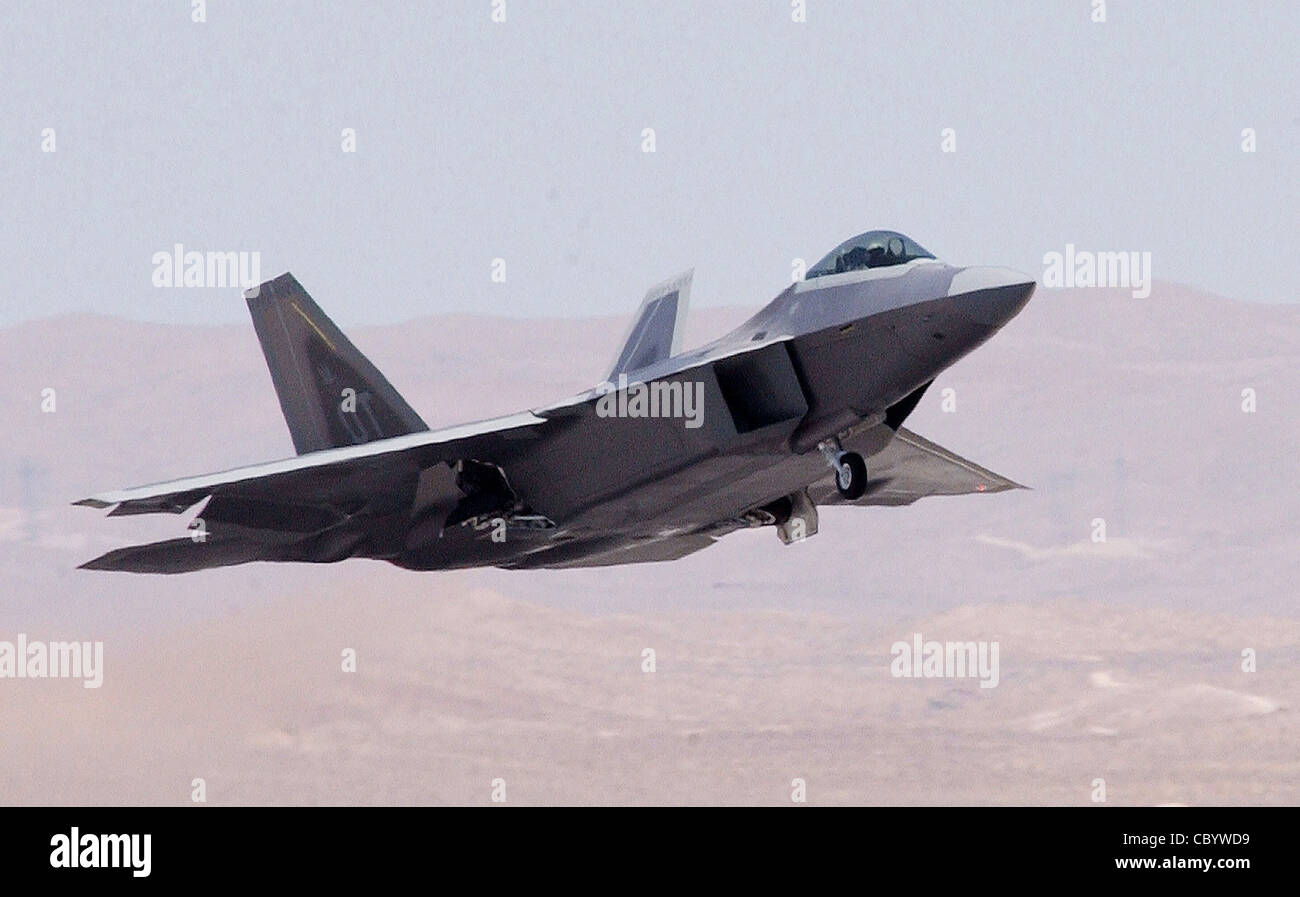 NELLIS AIR FORCE BASE, Nev. -- An F/A-22 Raptor takes off from here for ...