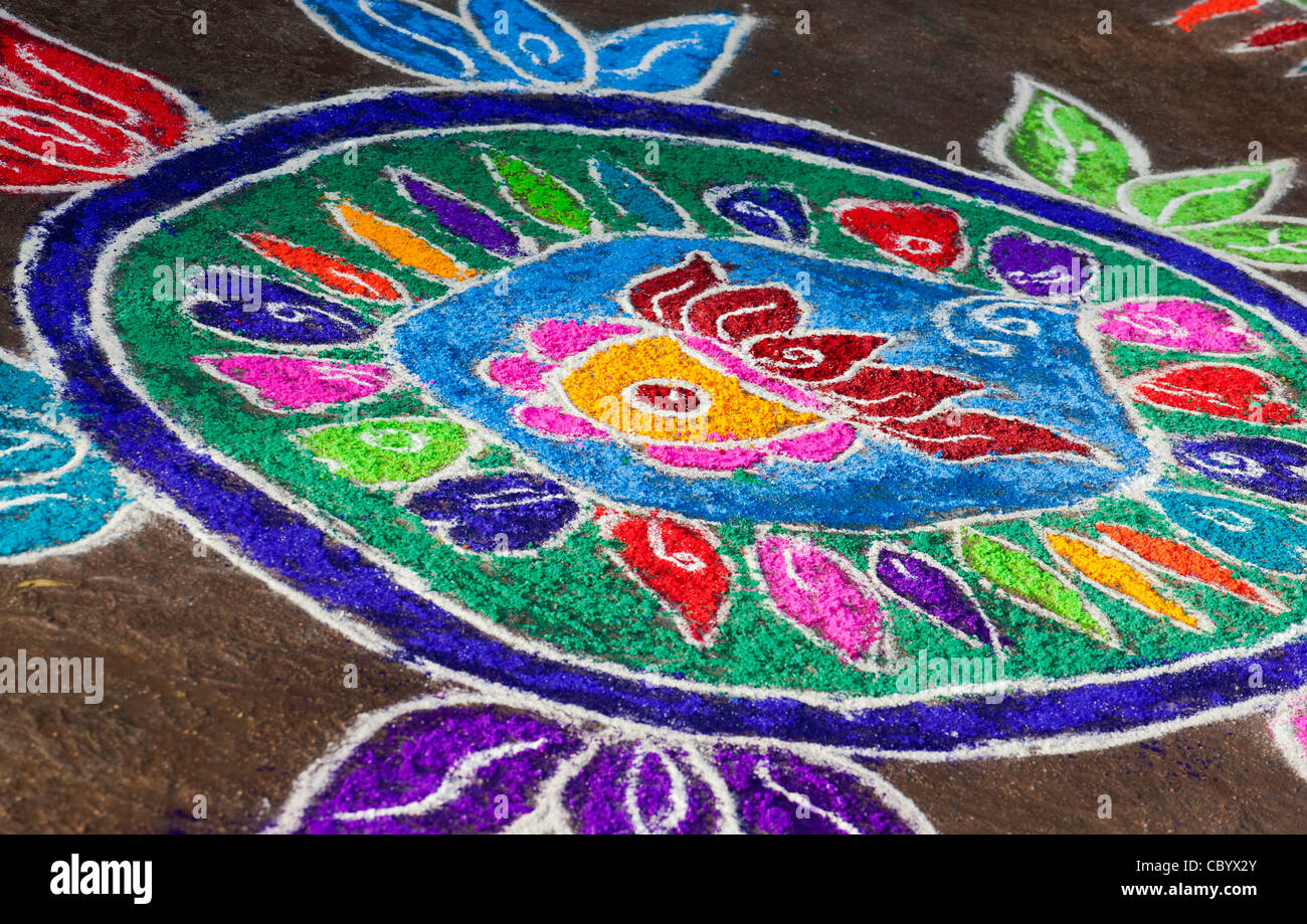 Rangoli festival coloured powder design in an Indian street. Andhra ...