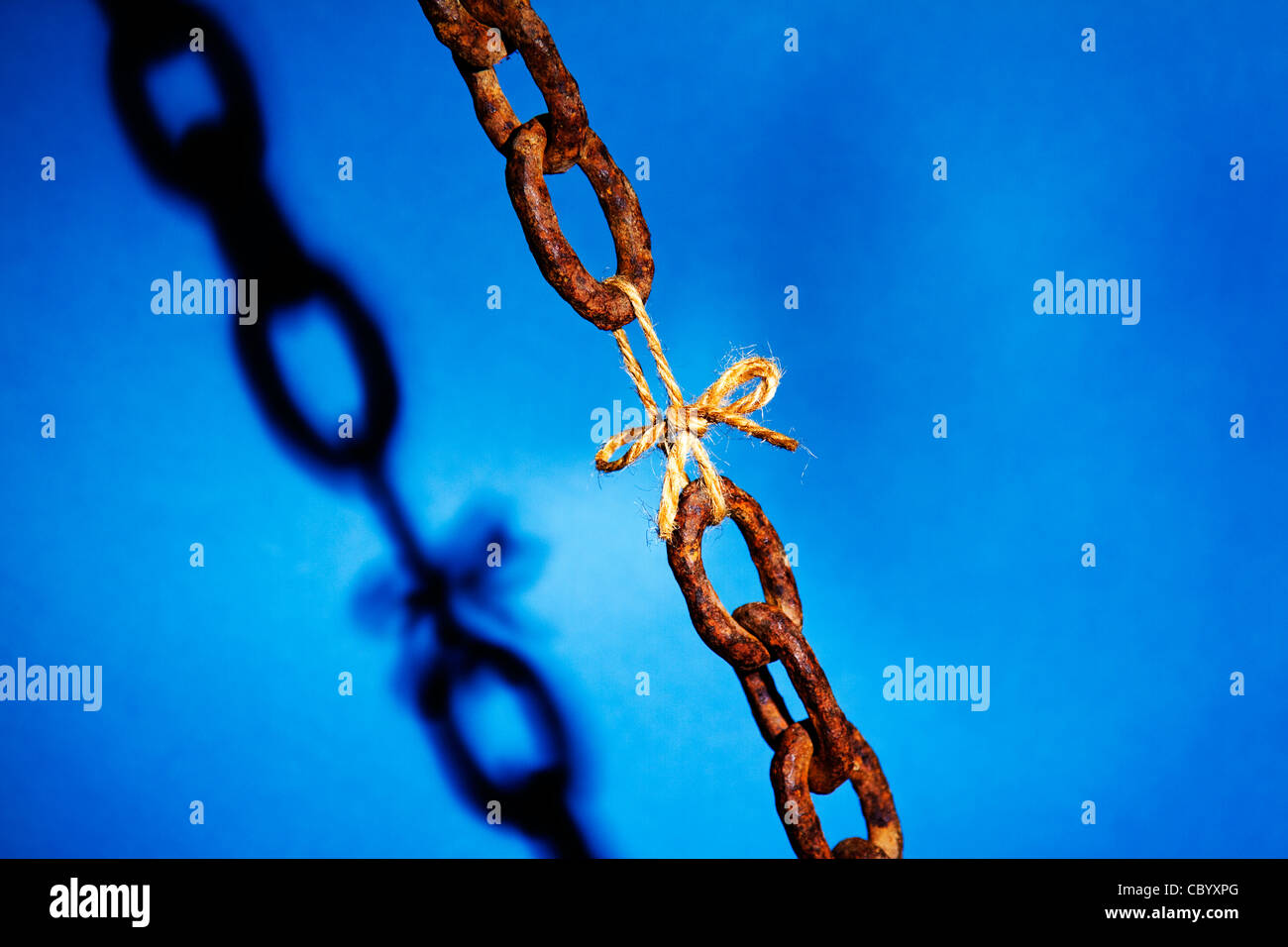 Chain with missing link Stock Photo - Alamy
