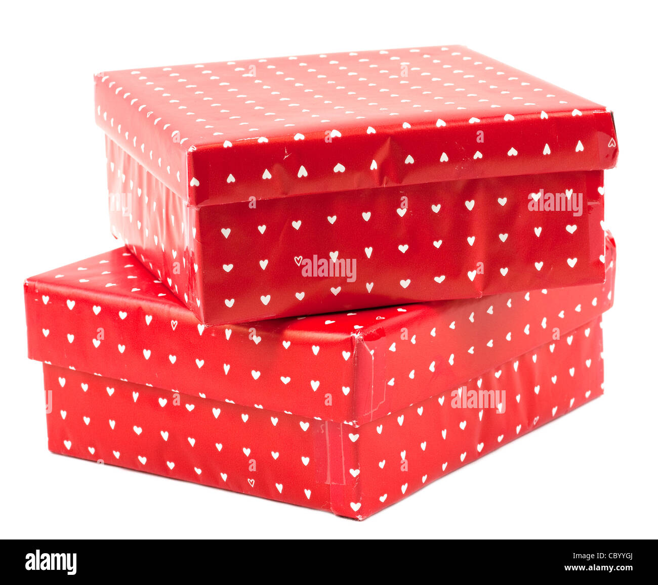 Simple homemade wrapped red boxes with hearts Stock Photo - Alamy