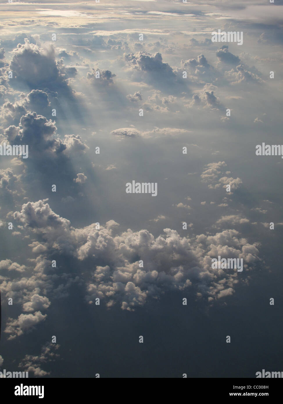 Clouds are seen from a plane after take-off in Mexico City, Mexico ...