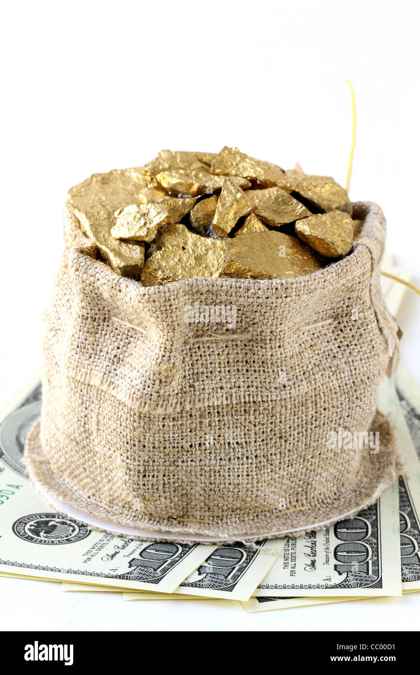 gold nuggets on a small pouch Stock Photo - Alamy