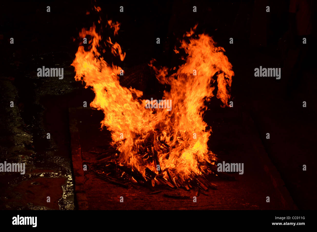 Fire shape in v Stock Photo - Alamy