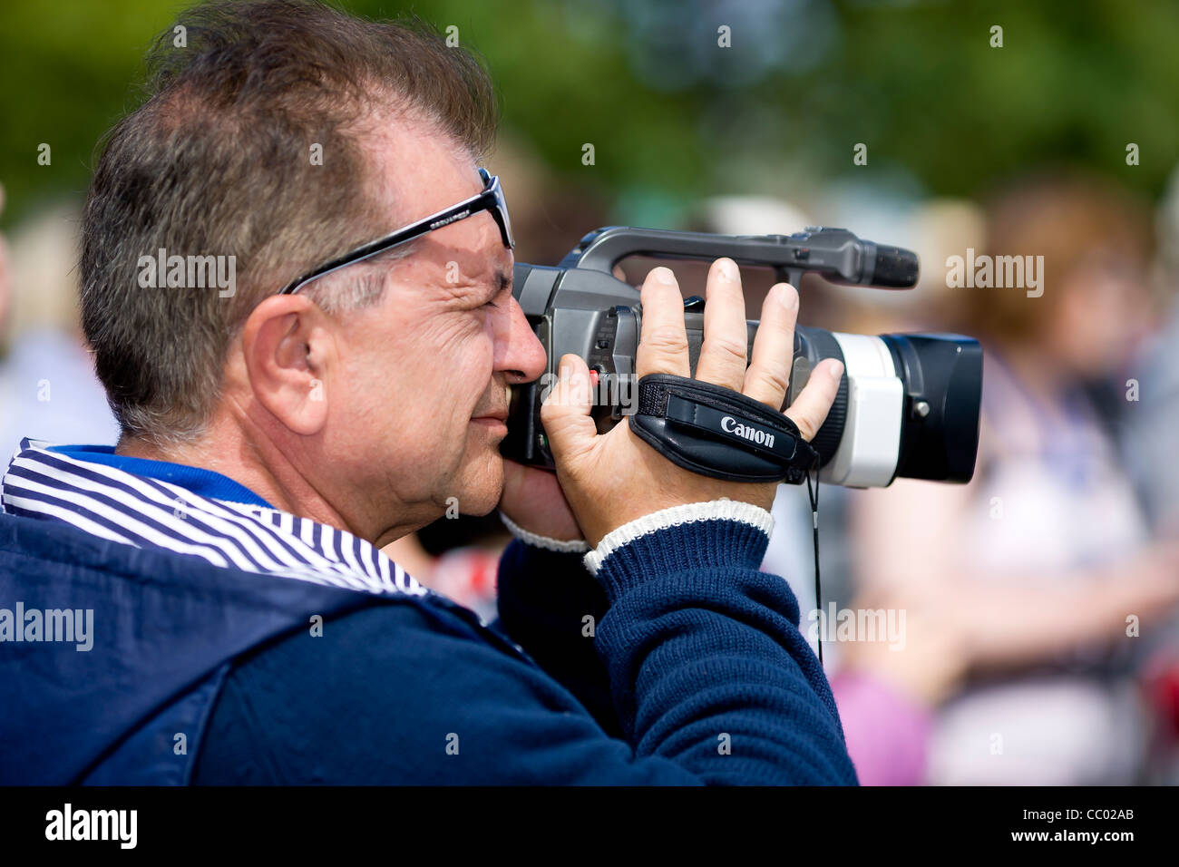 Tourist recording video Stock Photo - Alamy