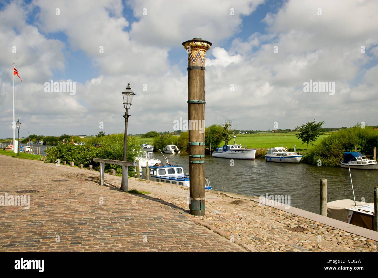 Water level post at Ribe river harbour Stock Photo - Alamy