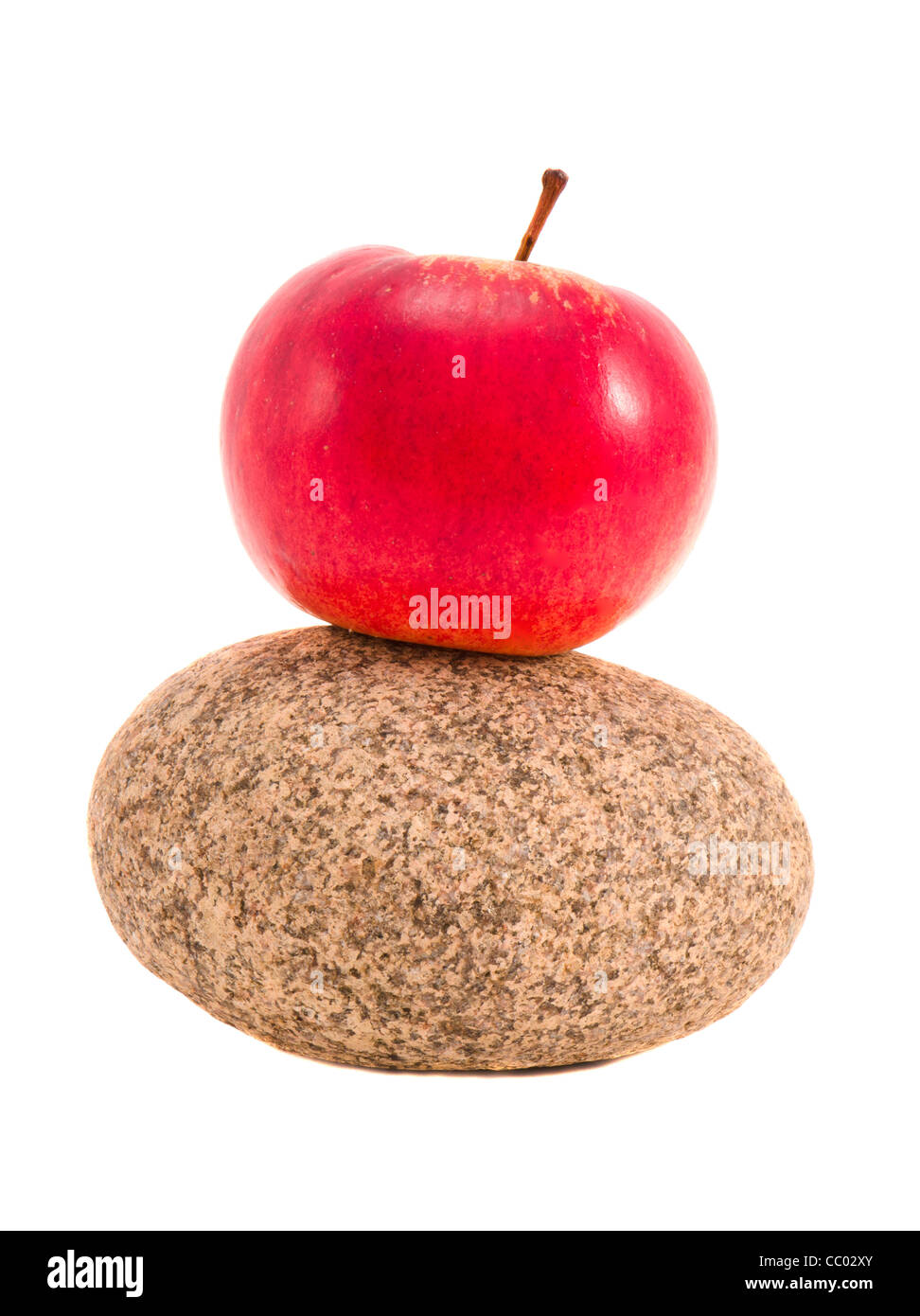 isolated on white stone with red apple Stock Photo - Alamy