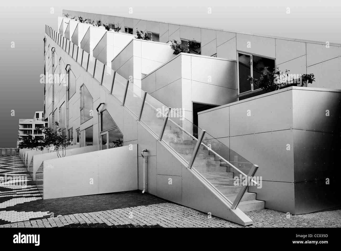 Modern high-rise block with staggered apartments Stock Photo - Alamy