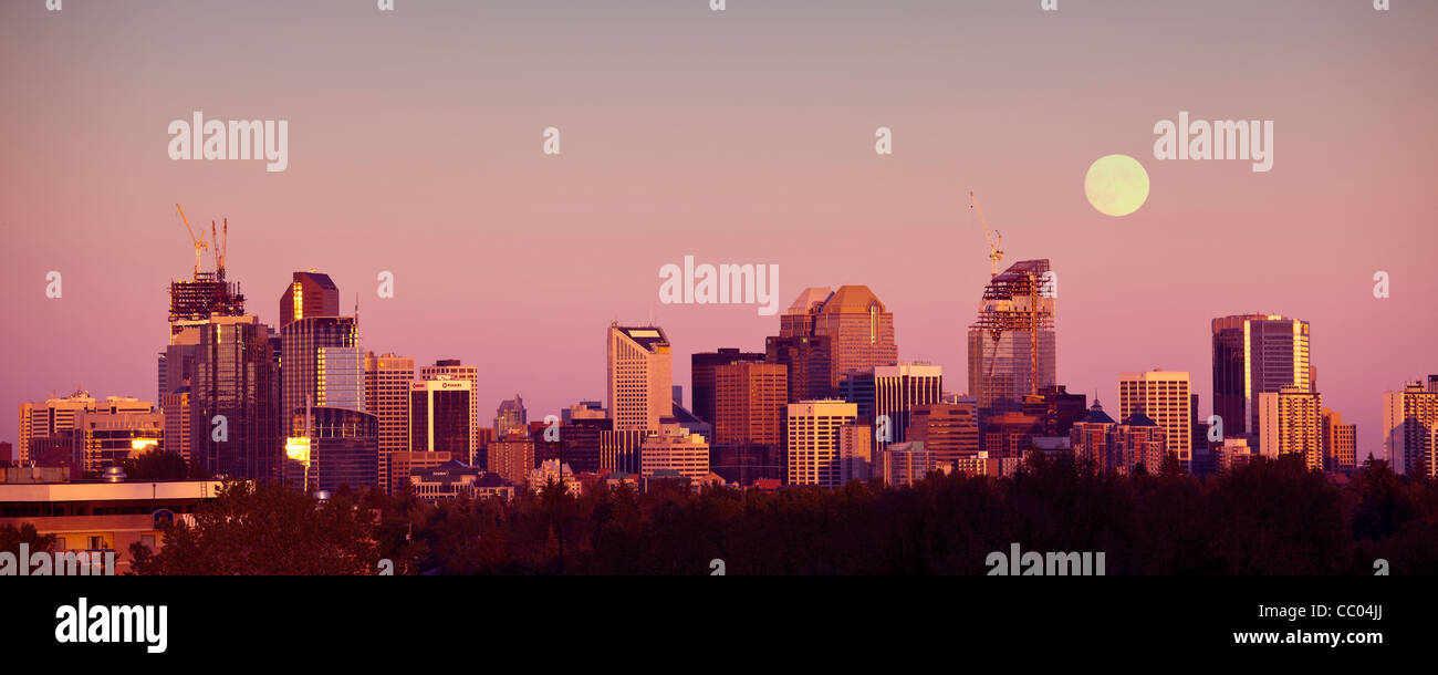 Calgary downtown in sunset with the moon in the background Stock Photo ...