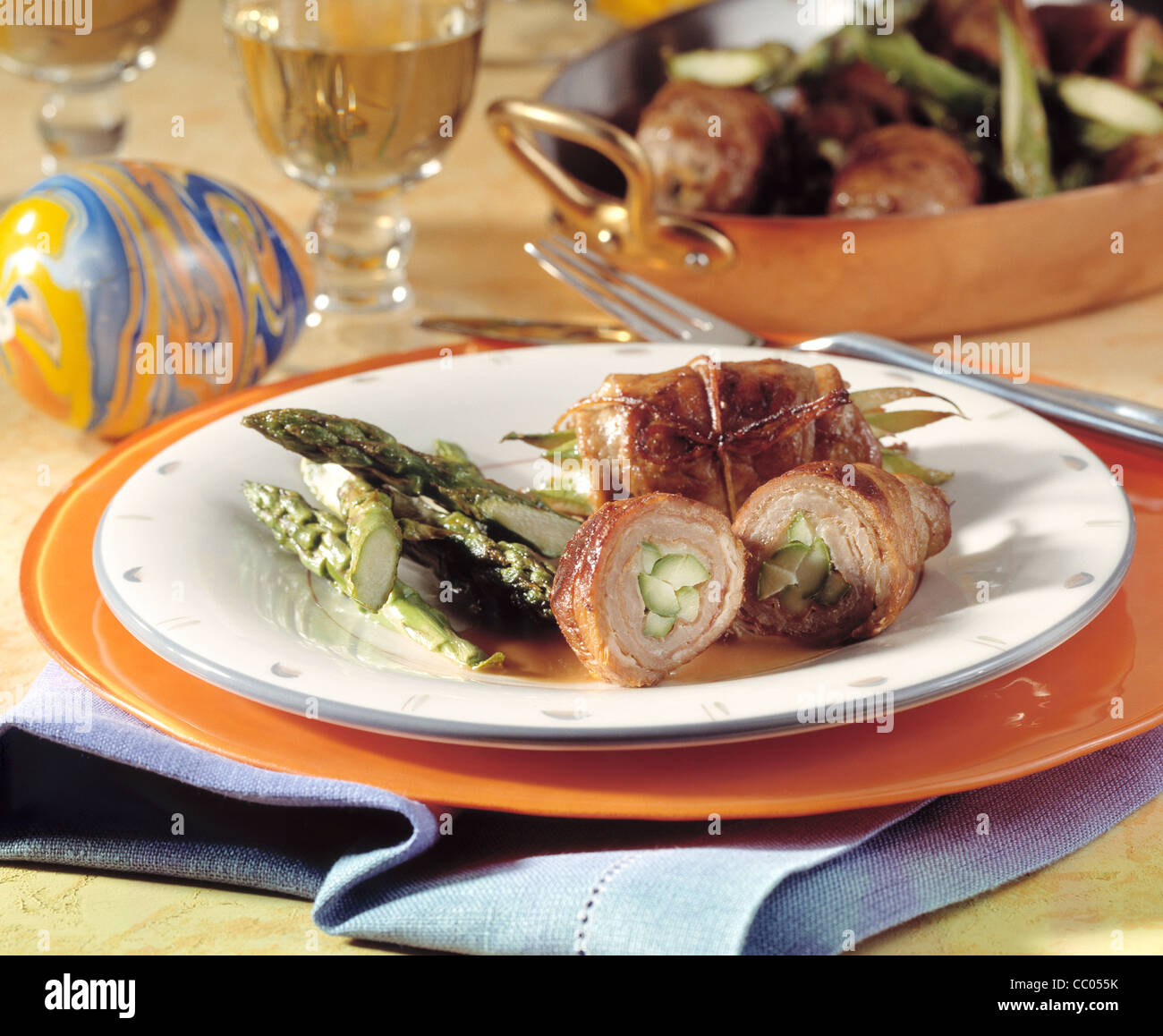 Veal roulade with green asparagus Stock Photo - Alamy