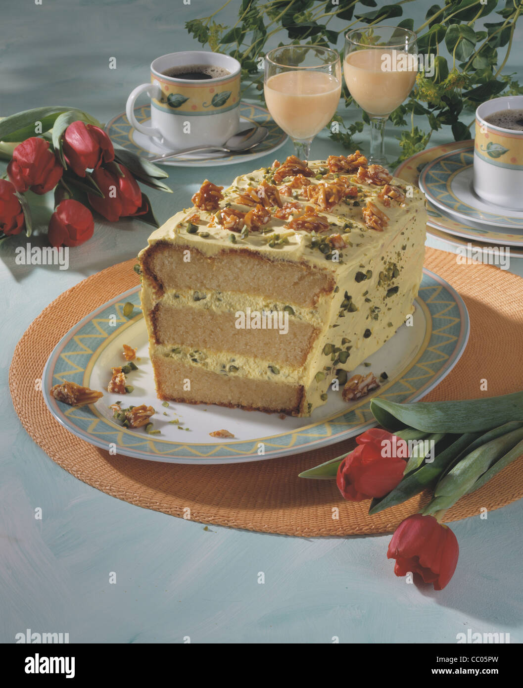 Cake with egg liquer butter cream and almond brittle Stock Photo - Alamy