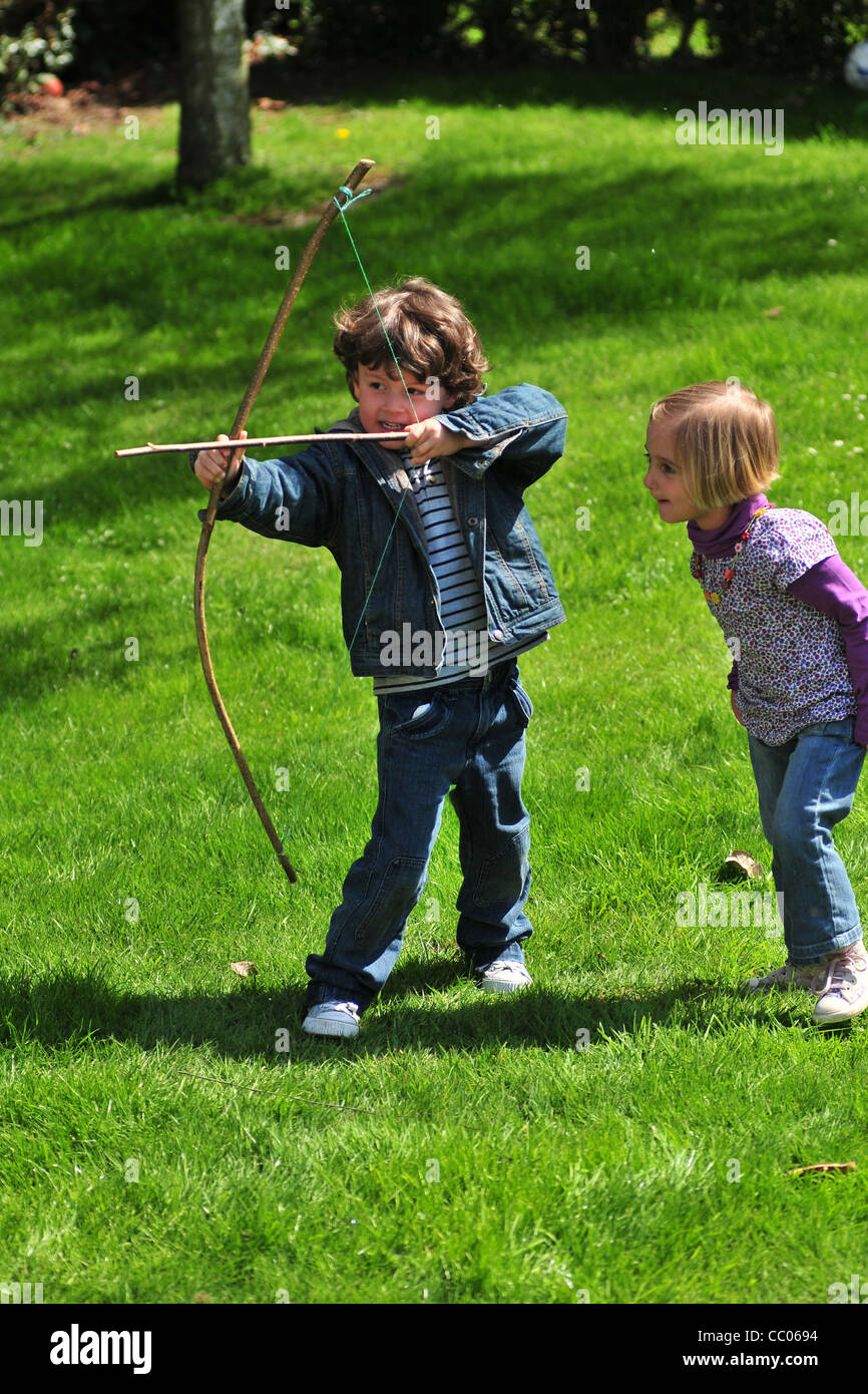 CHILDREN DOING ARCHERY Stock Photo - Alamy