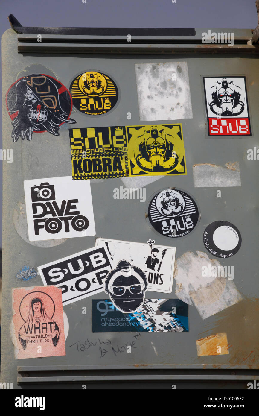 Selection of stickers on back of sign Stock Photo - Alamy