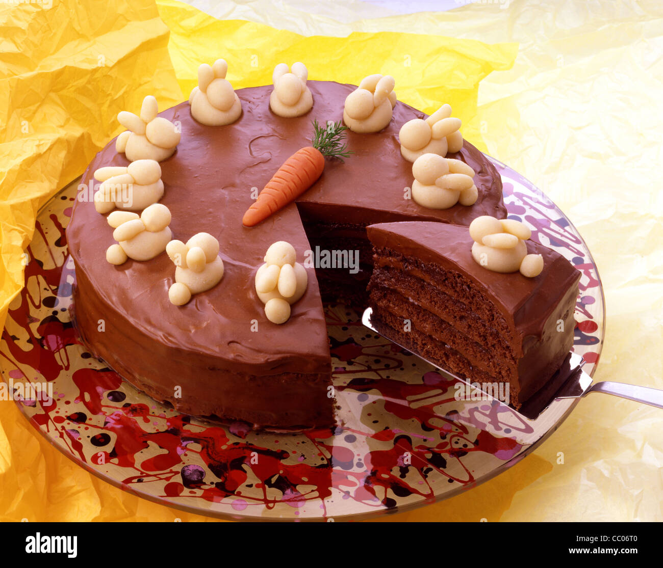 Chocolate paschal cake with marzipan decoration (rabbits Stock Photo ...