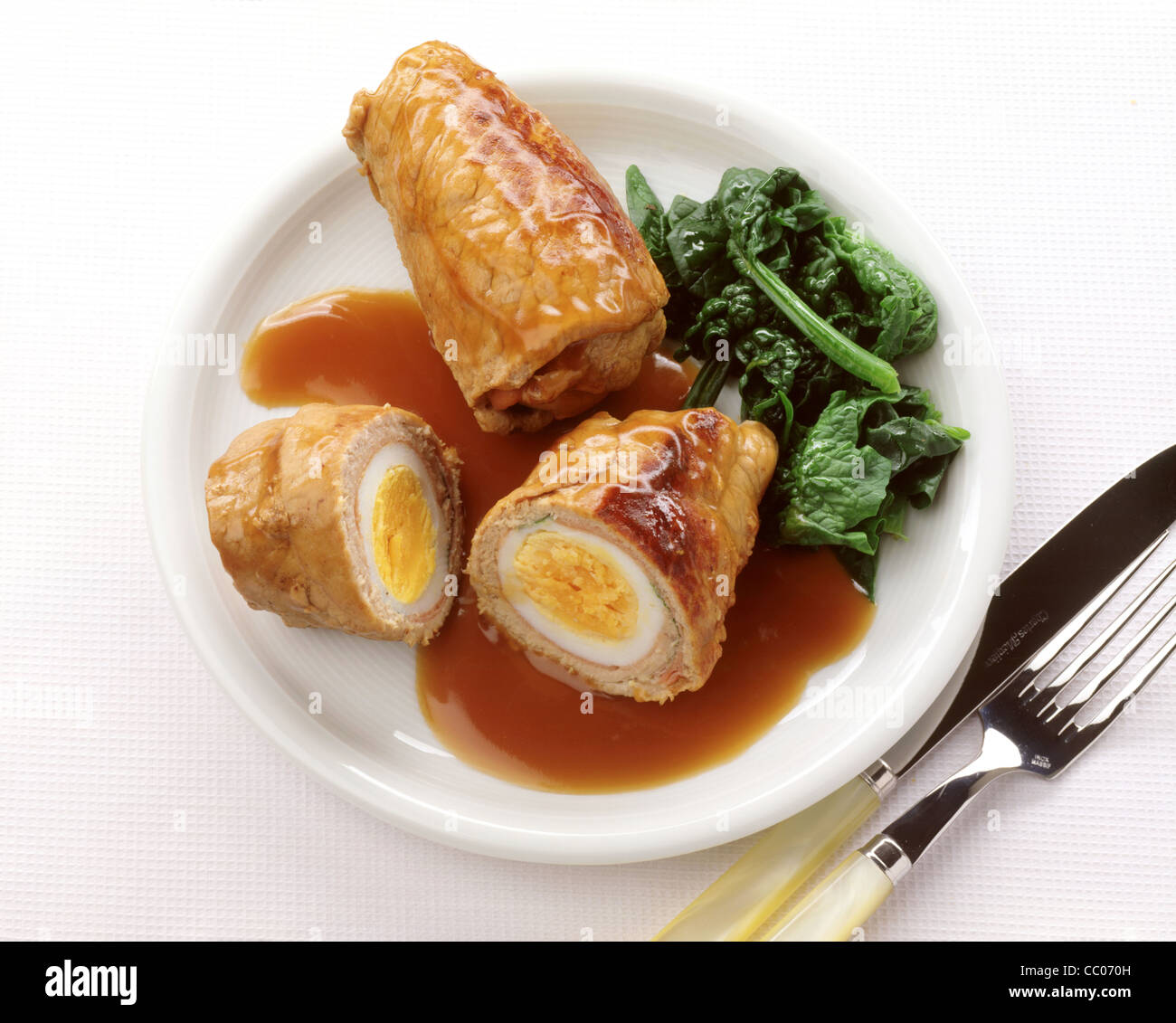 Veal roulade filled with eggs and spinach Stock Photo - Alamy