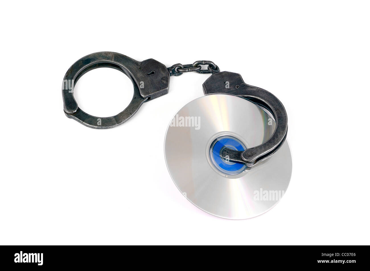 cd / dvd in handcuffs fastened, illegal copying Stock Photo - Alamy