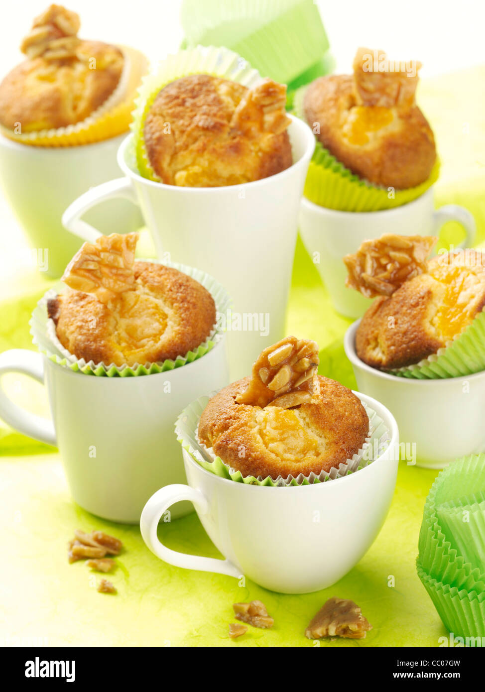 Mandarin muffins with egg liqueur and almond brittle Stock Photo - Alamy