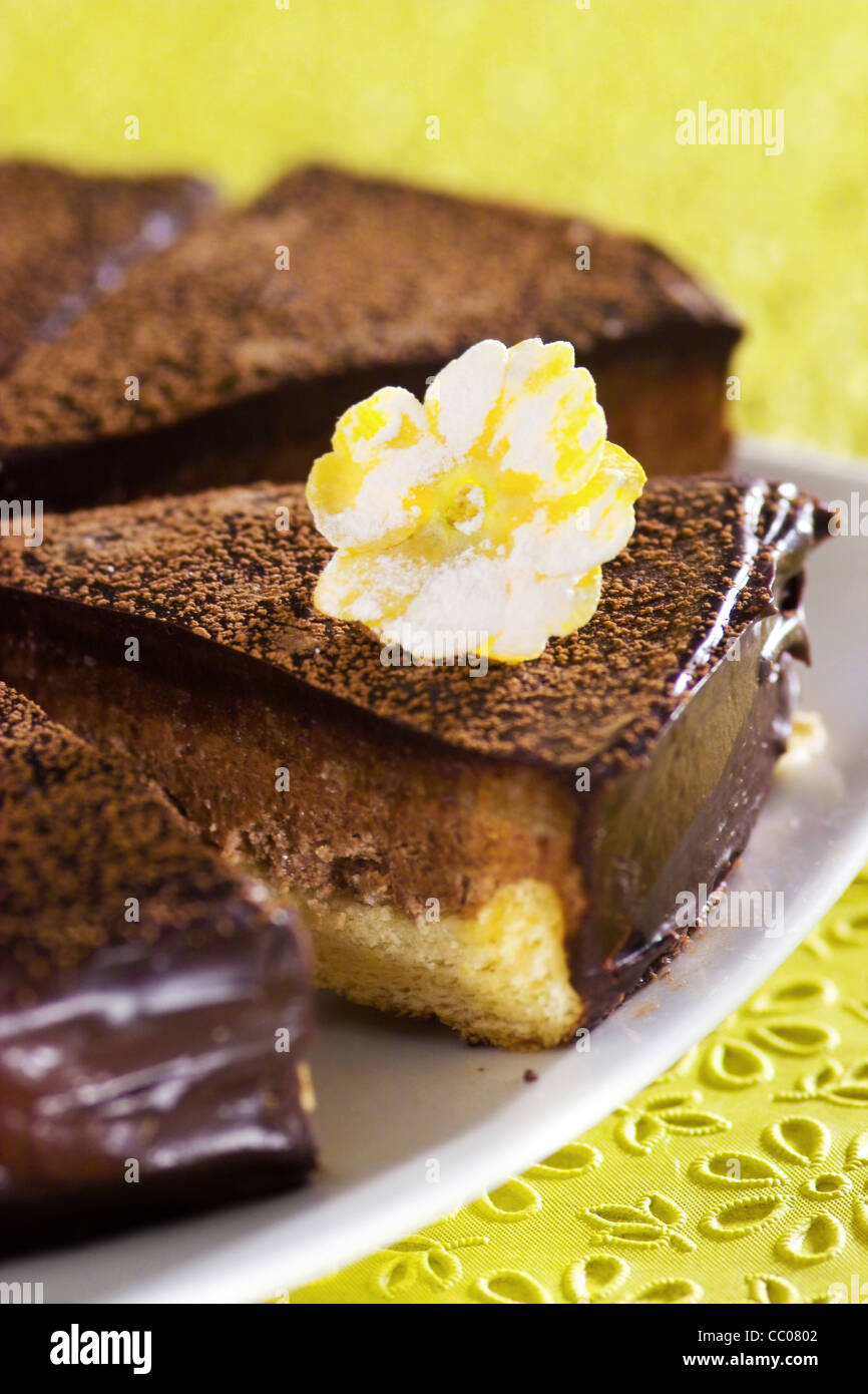 Almond cake with chocolate coating Stock Photo - Alamy