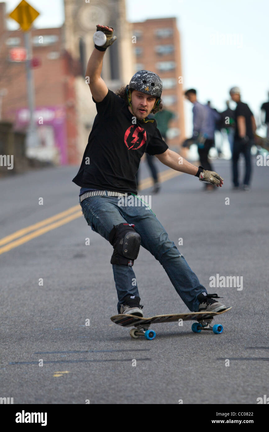 Young male skateboarder on urban street Stock Photo - Alamy