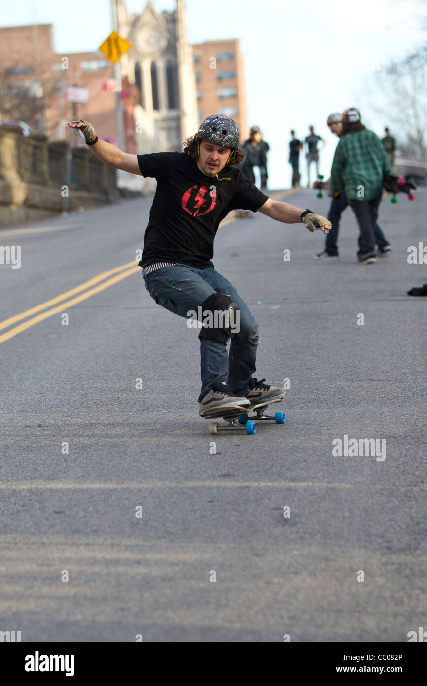 Young male skateboarder on urban street Stock Photo - Alamy