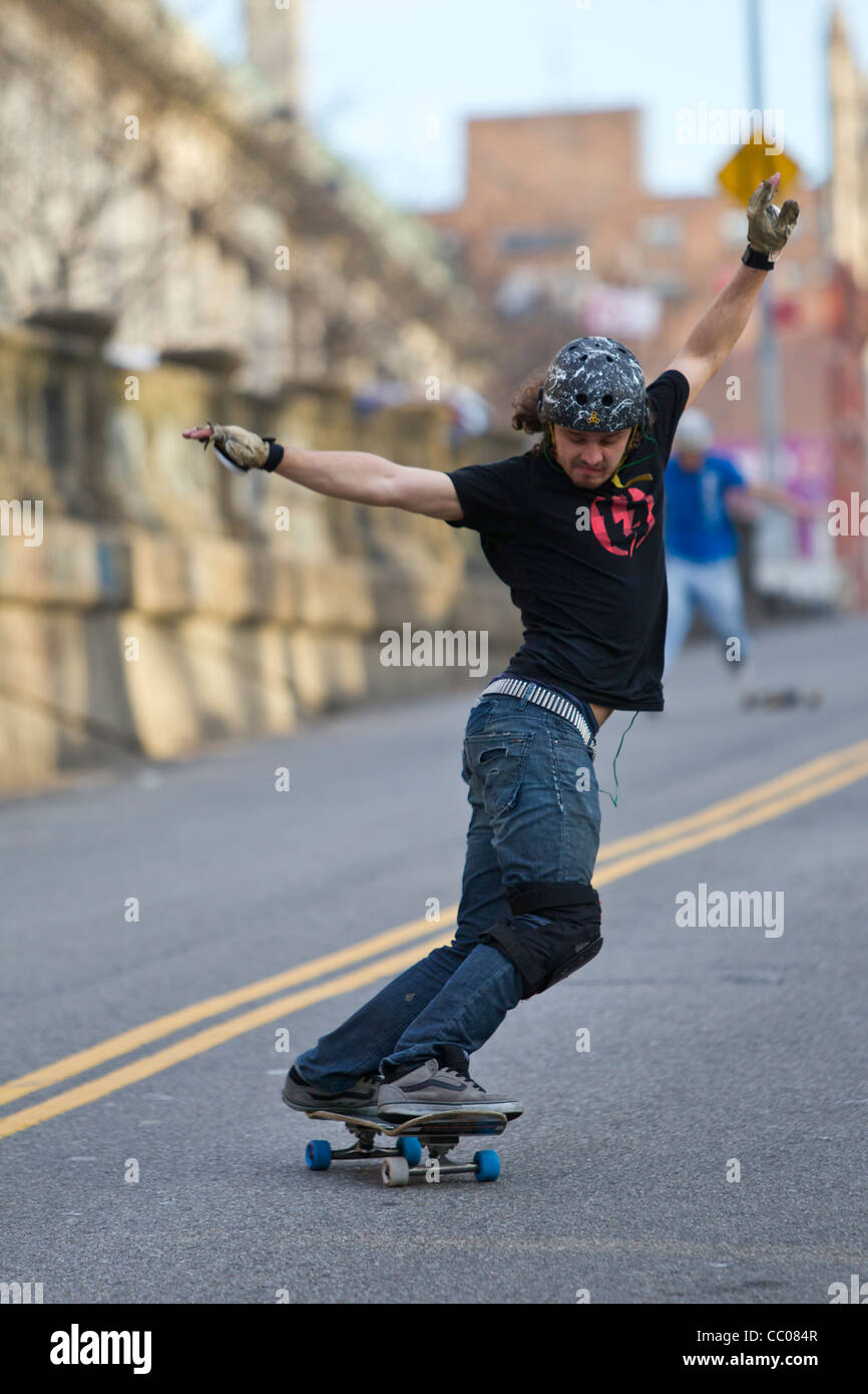 Young male skateboarder on urban street Stock Photo - Alamy