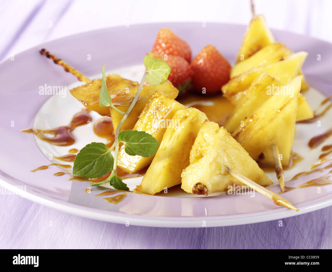 Caramelised pineapple sticks Stock Photo - Alamy