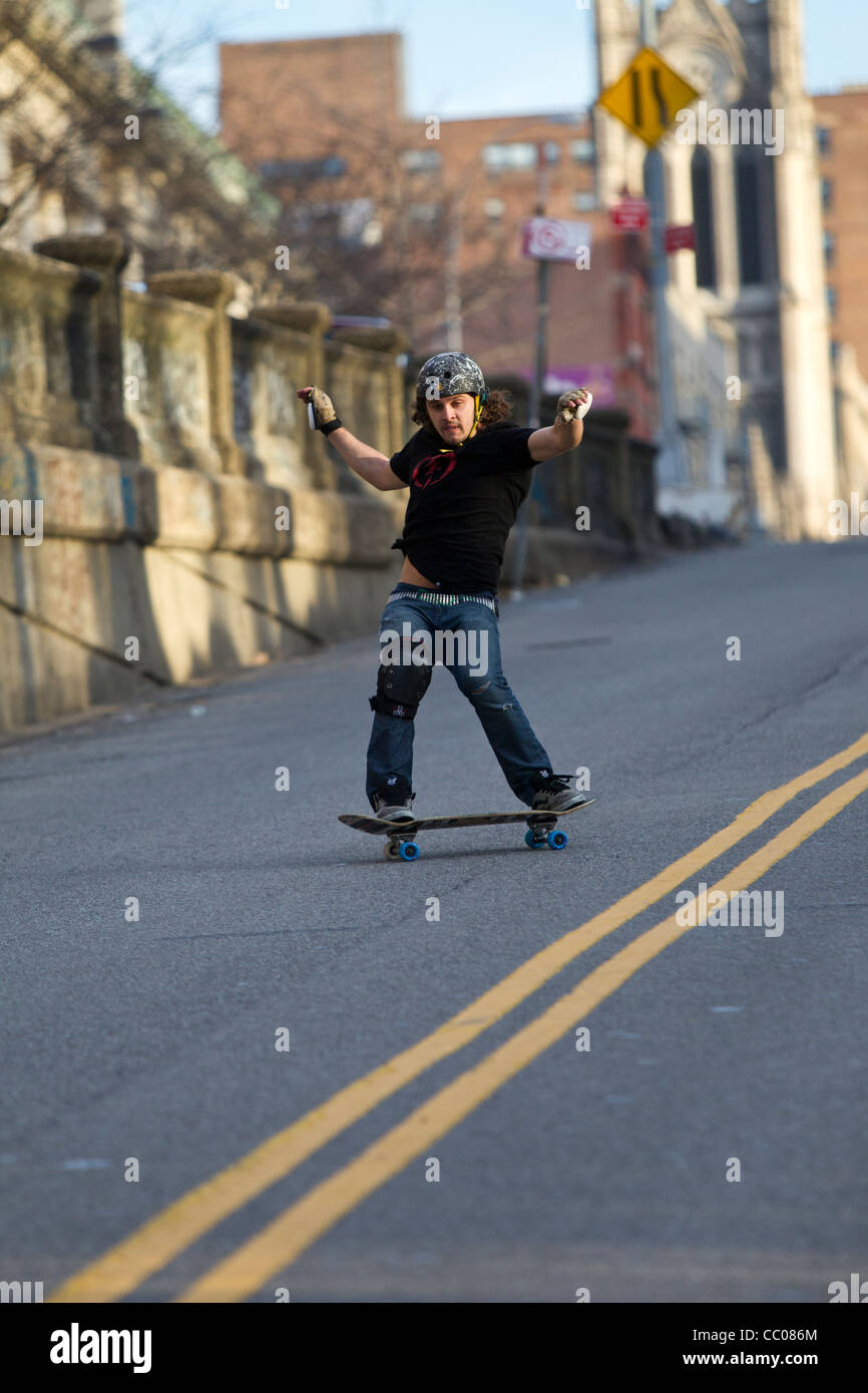 Young male skateboarder on urban street Stock Photo - Alamy