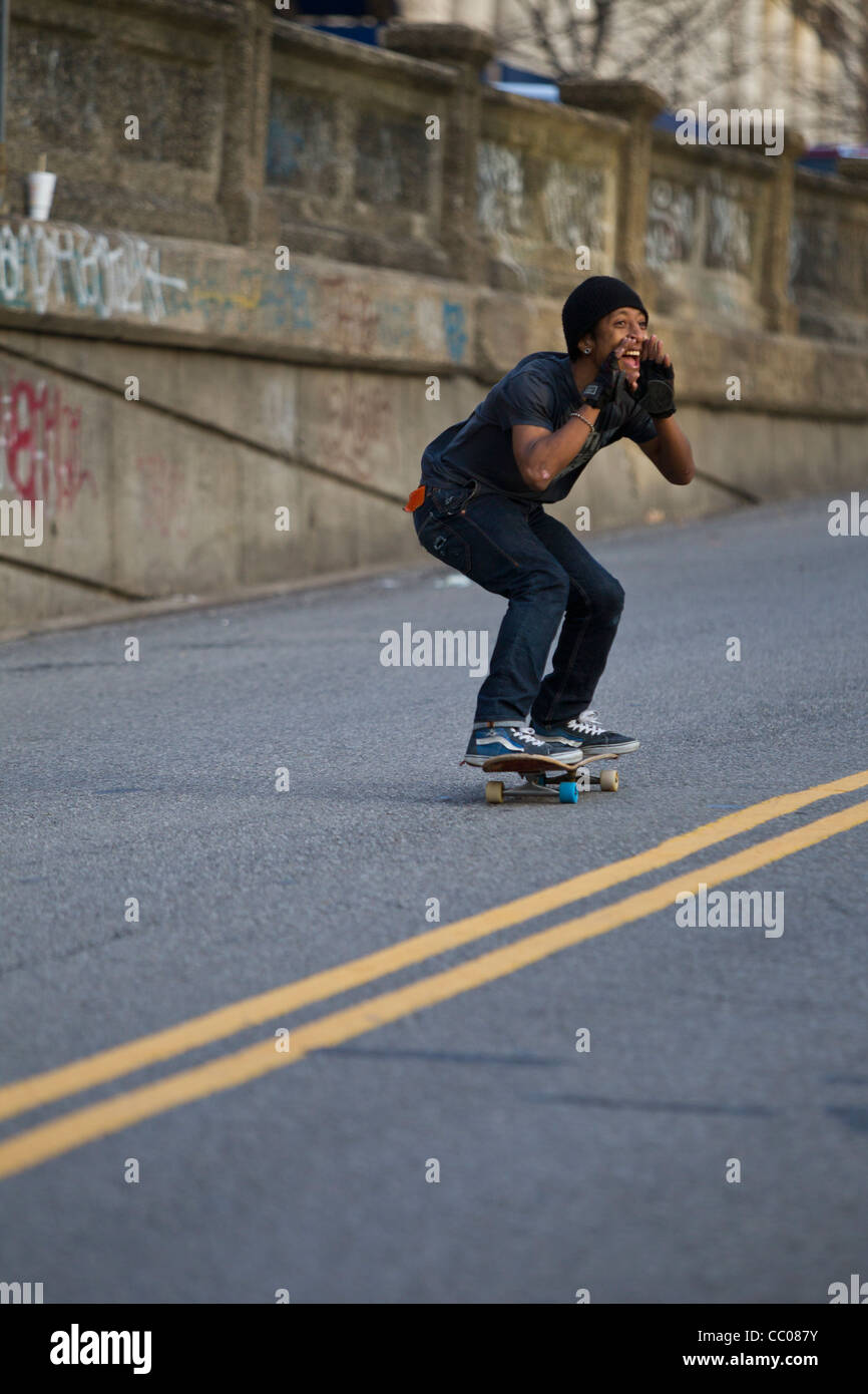 Young male skateboarder on urban street Stock Photo - Alamy