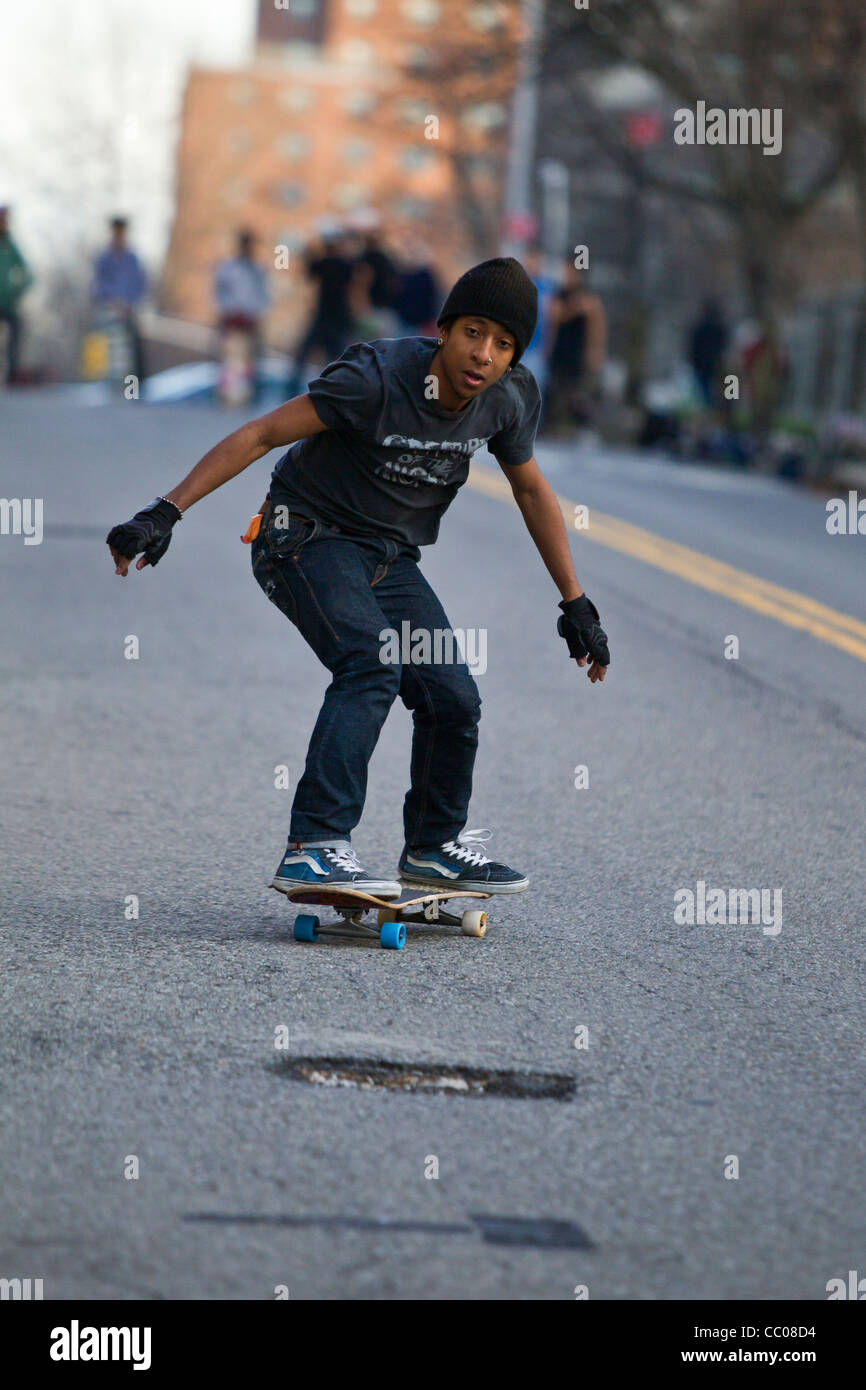 Young male skateboarder on urban street Stock Photo - Alamy