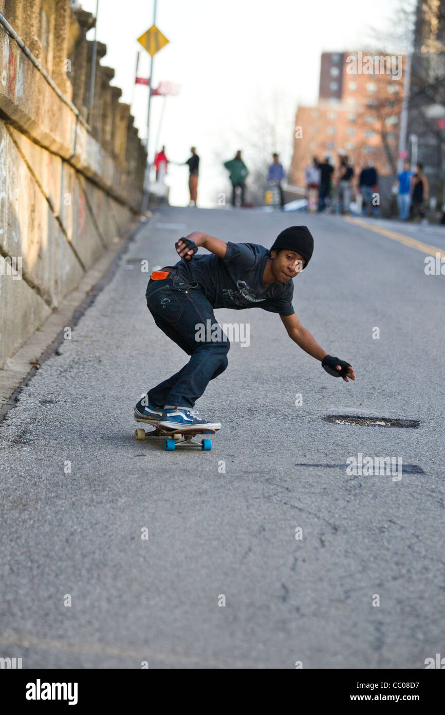 Young male skateboarder on urban street Stock Photo - Alamy