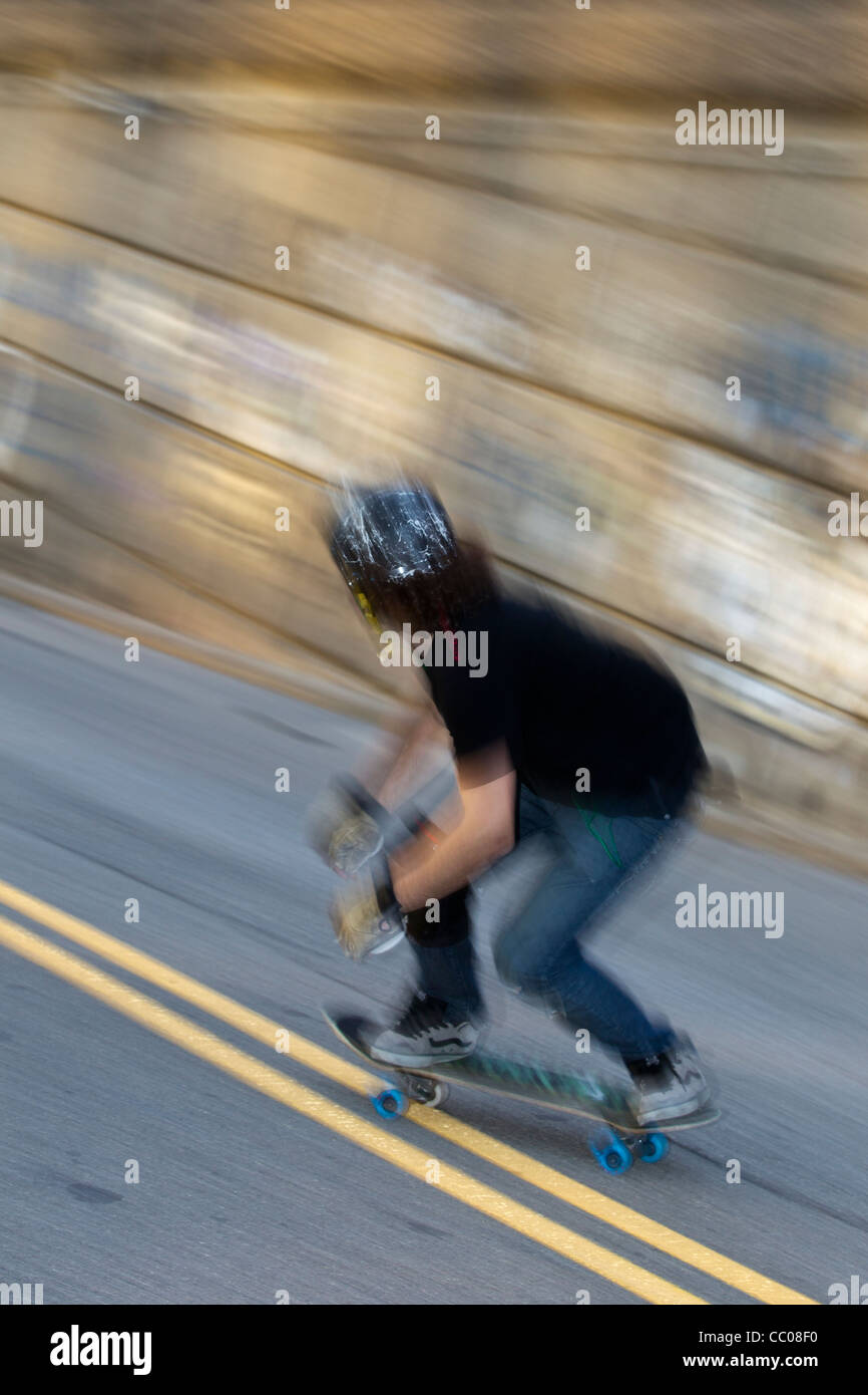 Young male skateboarder on urban street Stock Photo - Alamy