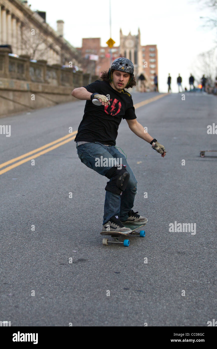 Young male skateboarder on urban street Stock Photo - Alamy