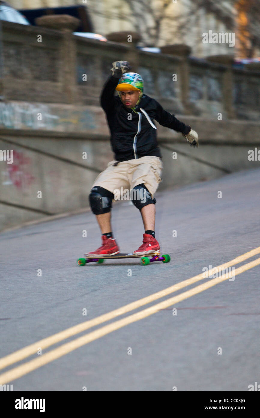 Young male skateboarder on urban street Stock Photo - Alamy