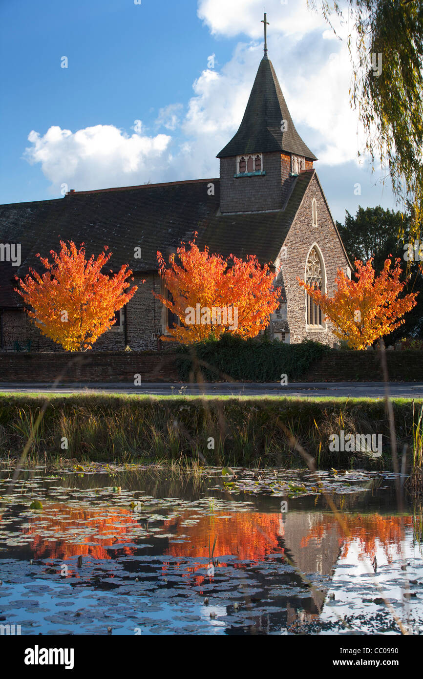 Buckland village church and pond, autumn, Surrey Hills, Surrey Stock ...