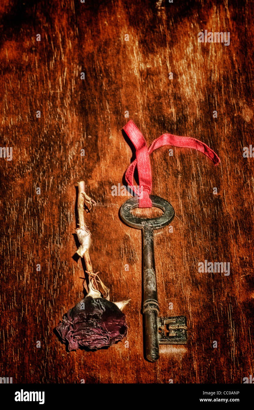 Old key with ribbon hi-res stock photography and images - Alamy