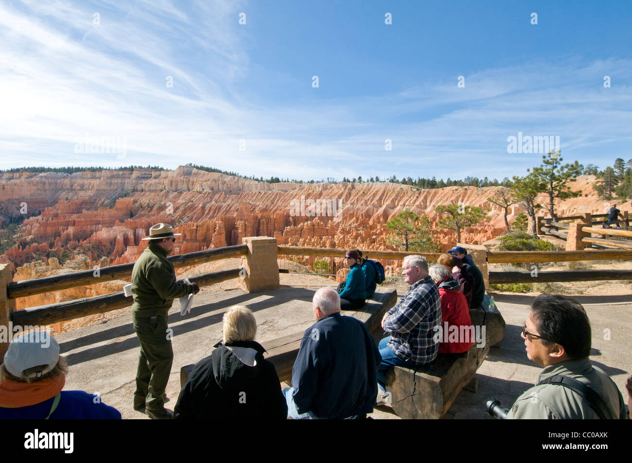 National Park ranger giving tour explaining the geology of Bryce Canyon ...