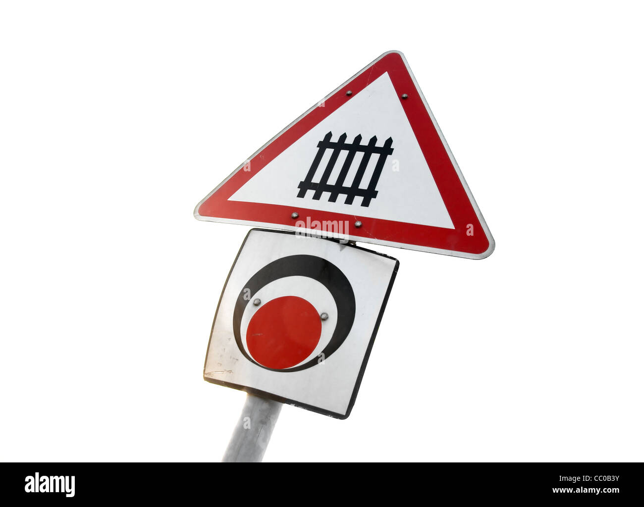 Railway crossing warning sign isolated on white Stock Photo - Alamy