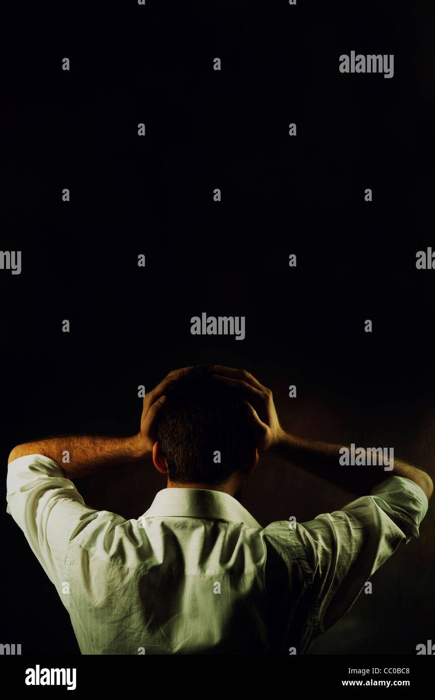 Man, scared, back view hi-res stock photography and images - Alamy