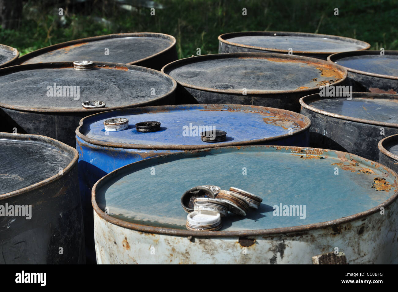 Rusty industrial metal barrels. Abstract background Stock Photo - Alamy
