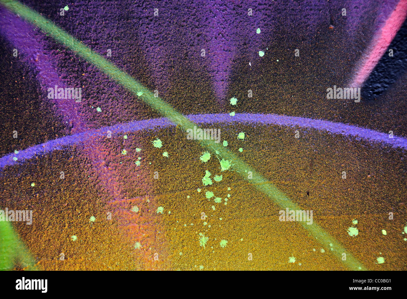Paint splatter and colored lines on rough surface. Abstract artistic ...