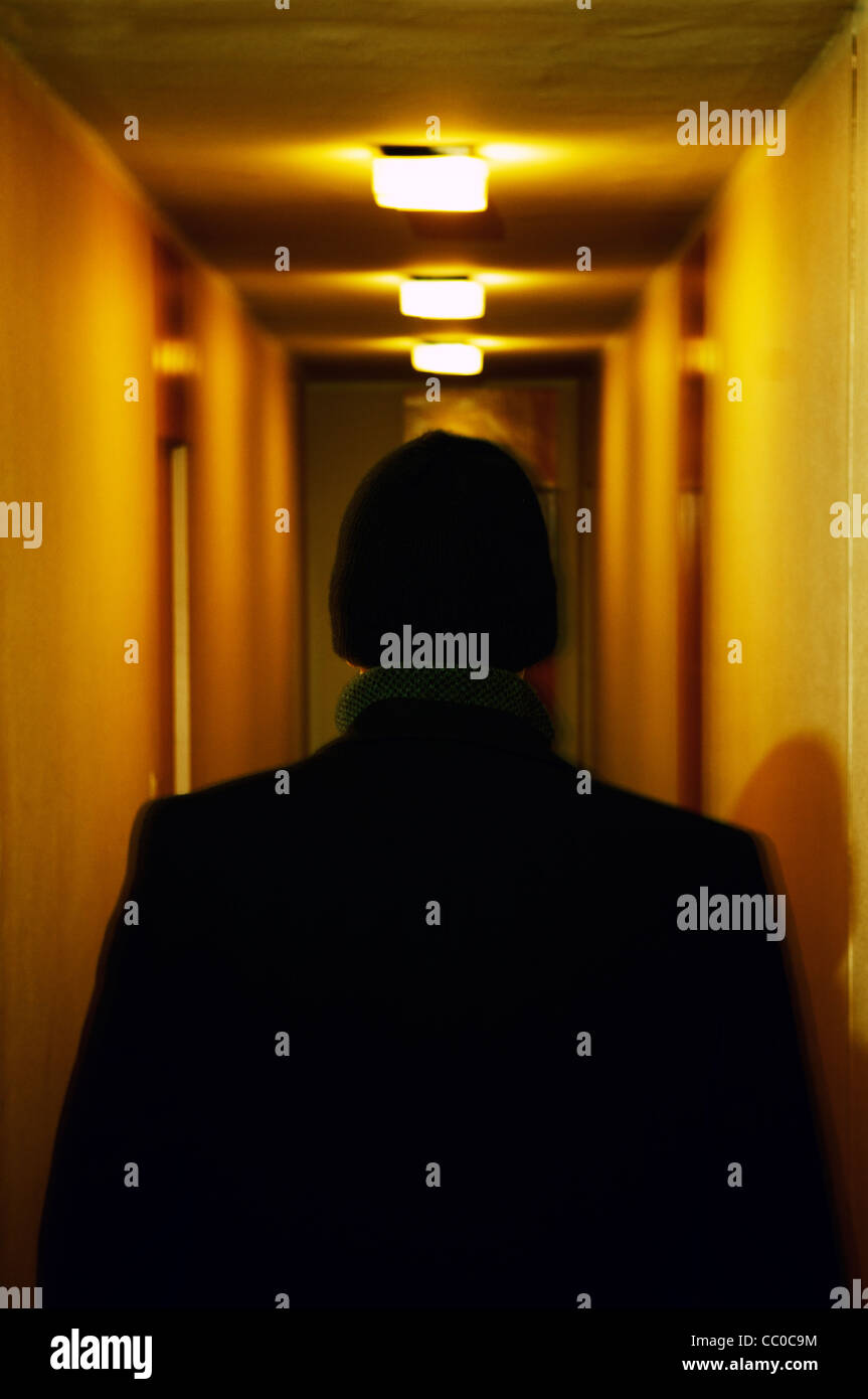 Sinister male in the hallway Stock Photo - Alamy