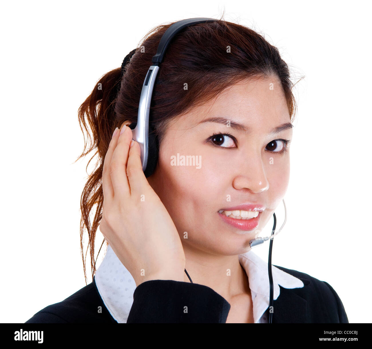 Friendly Customer Representative with headset smiling during a ...