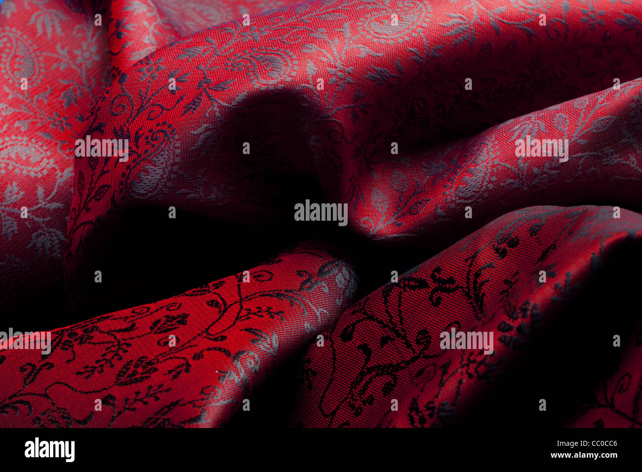 Expensive red fabric with complex ornament Stock Photo - Alamy