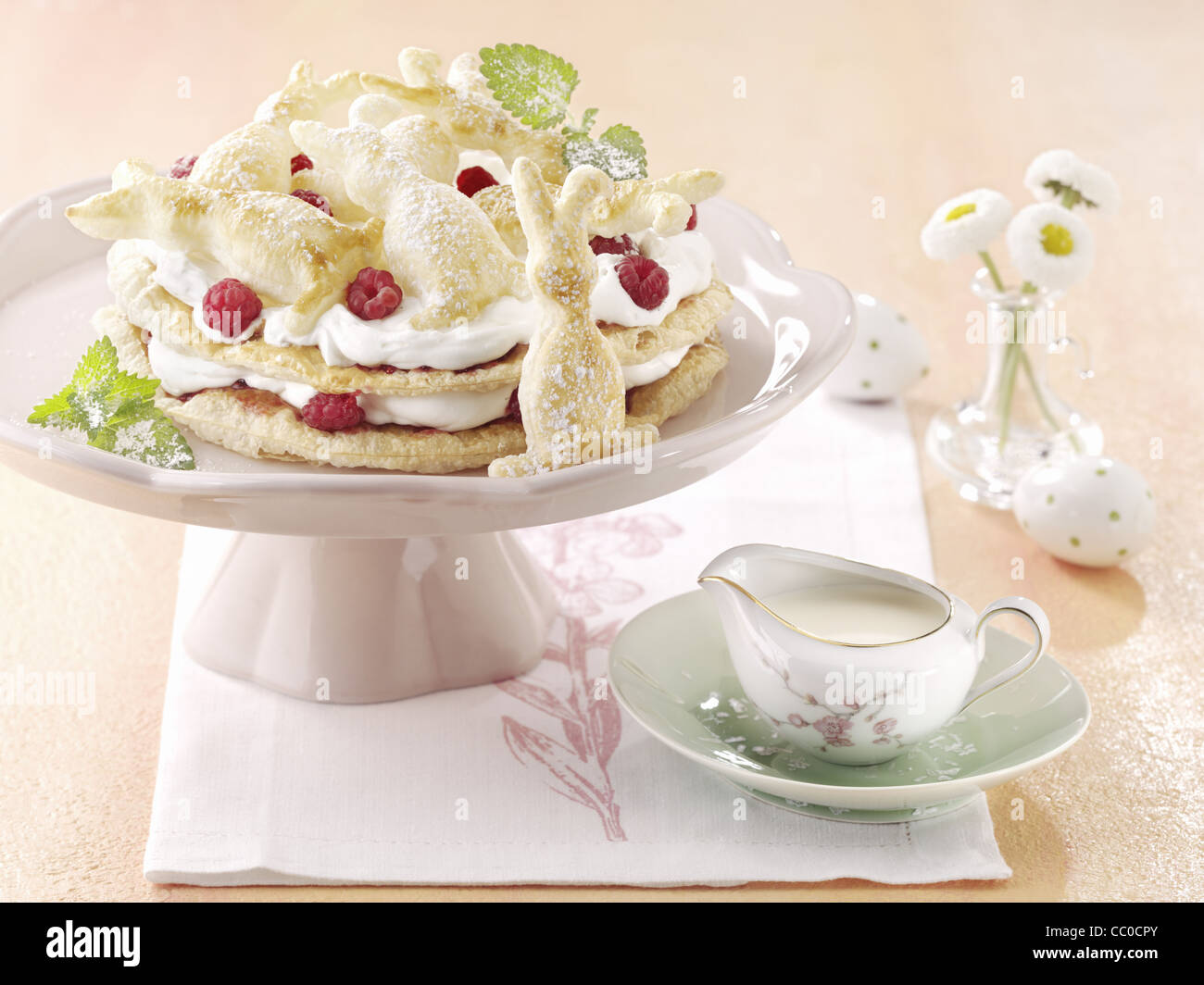 Easter bunny puff pastry with raspberry cream Stock Photo - Alamy