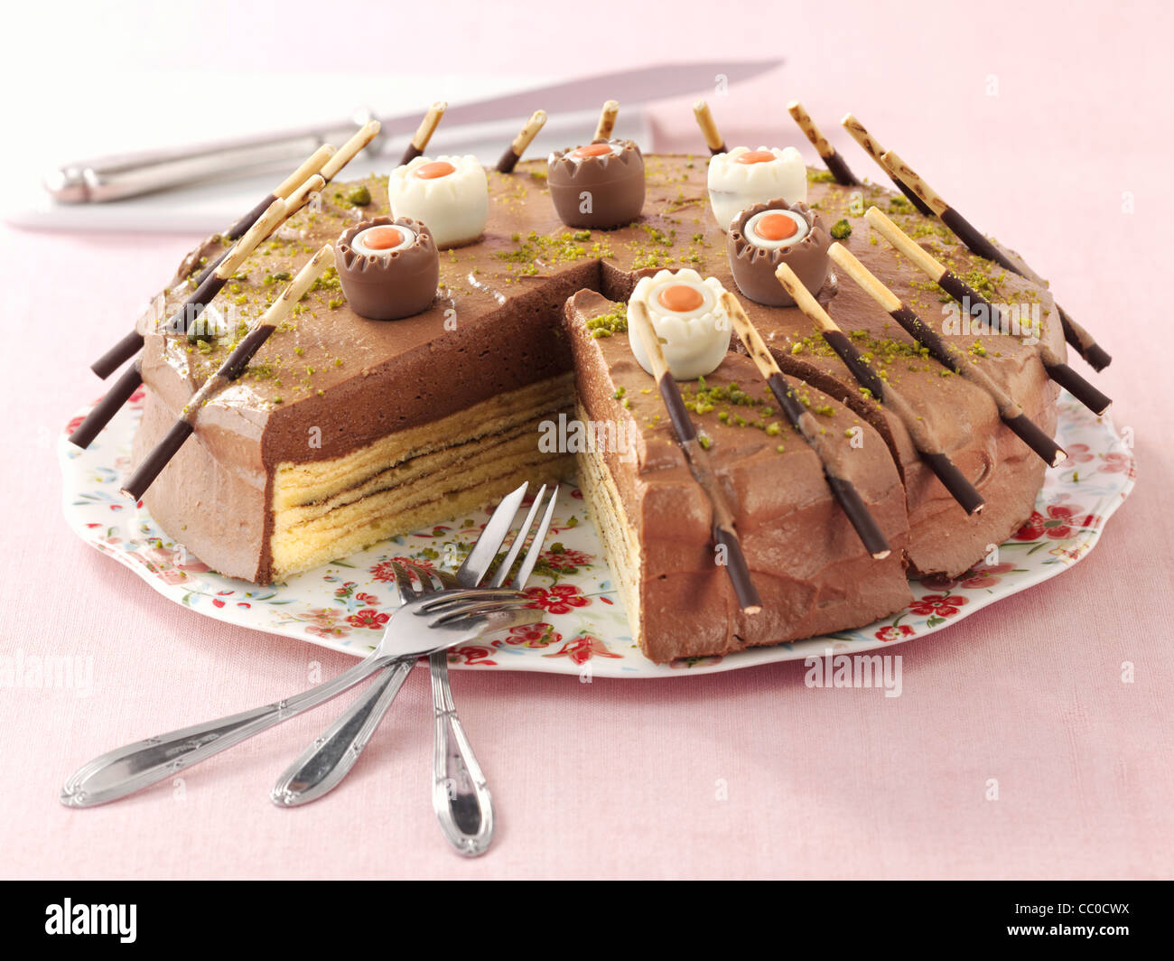 Pyramid cake with chocolate - egg - nog - cream, cut Stock Photo - Alamy